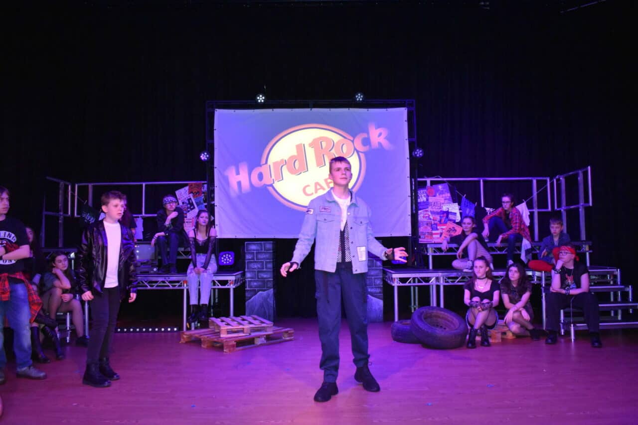 Students rock the stage in We Will Rock You School Edition - Laurus ...