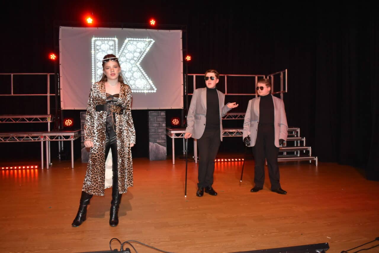 Students rock the stage in We Will Rock You School Edition - Laurus ...